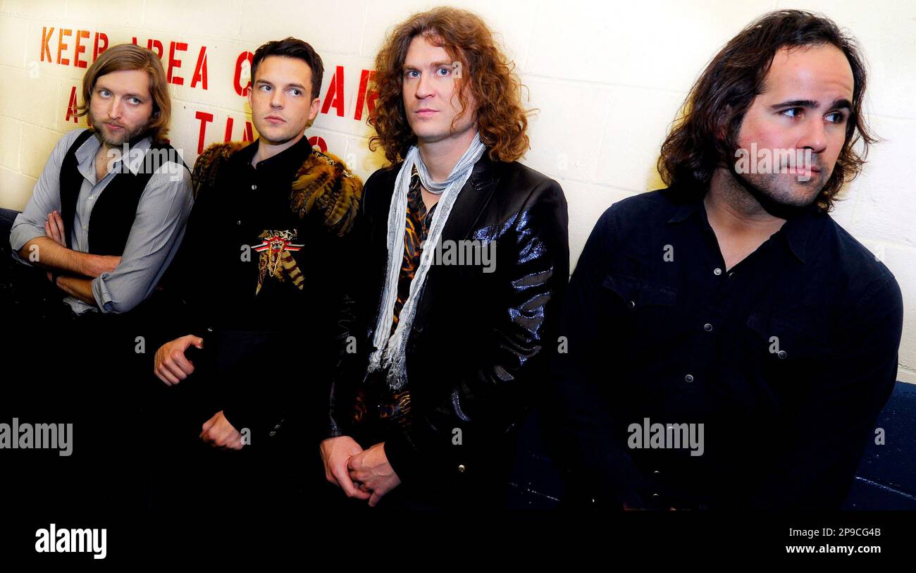 The Las Vegas-based rock band The Killers, from left, bass player Mark ...