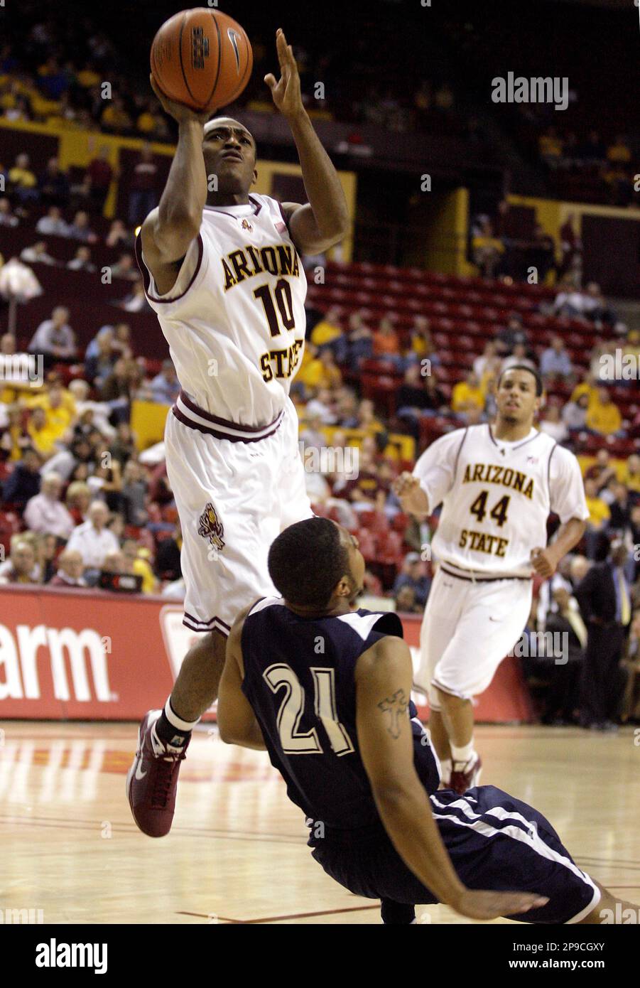 Arizona State guard Jamelle McMillan (10) collides with Jackson State ...