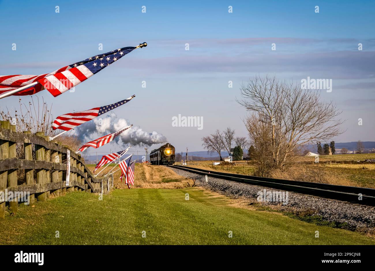 A View of a Classic Steam Passenger Train Approaching, With American ...