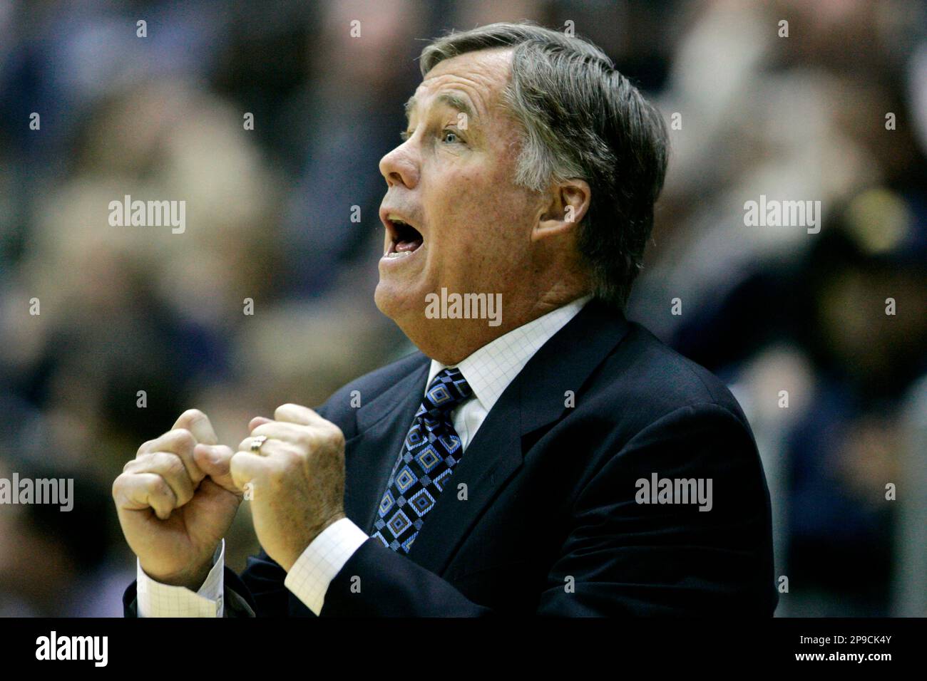 California head coach Mike Montgomery directs his team against DePaul ...