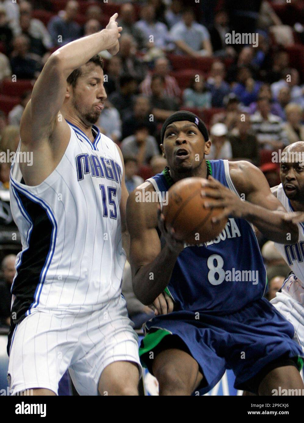 Minnesota Timberwolves forward Ryan Gomes (8) looks for a shot as he is ...