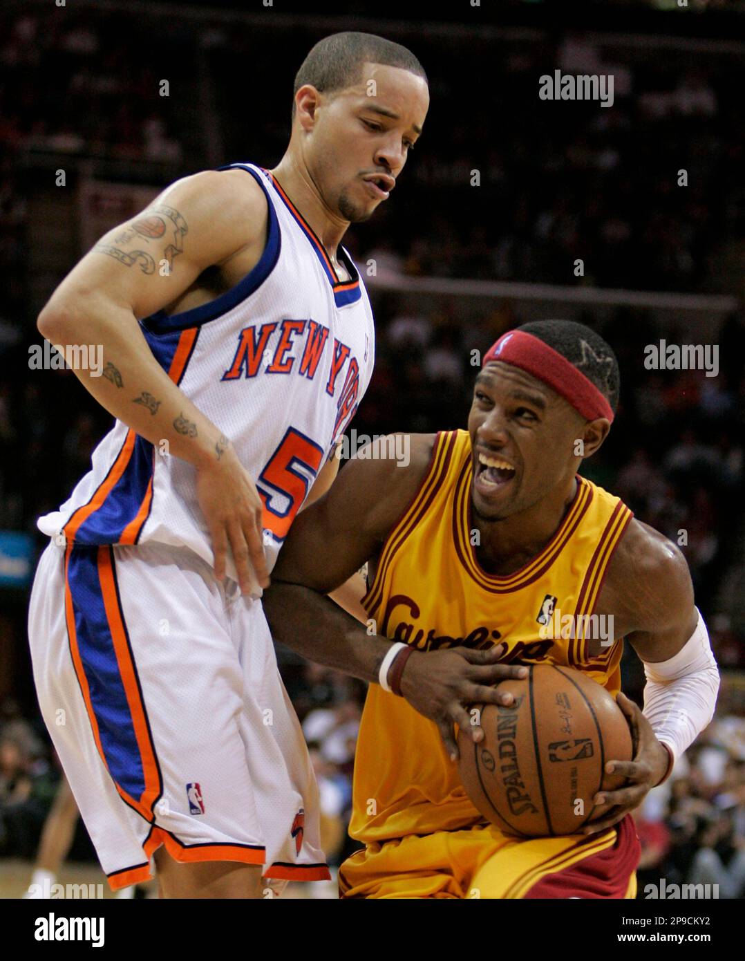 Cleveland Cavaliers' Daniel Gibson, right, tries to get past New York ...