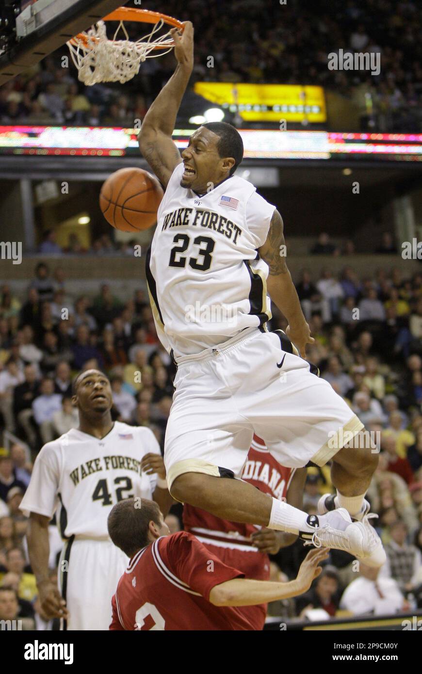 Wake Forest's James Johnson (23) dunks over Indiana's Matt Roth (2 ...