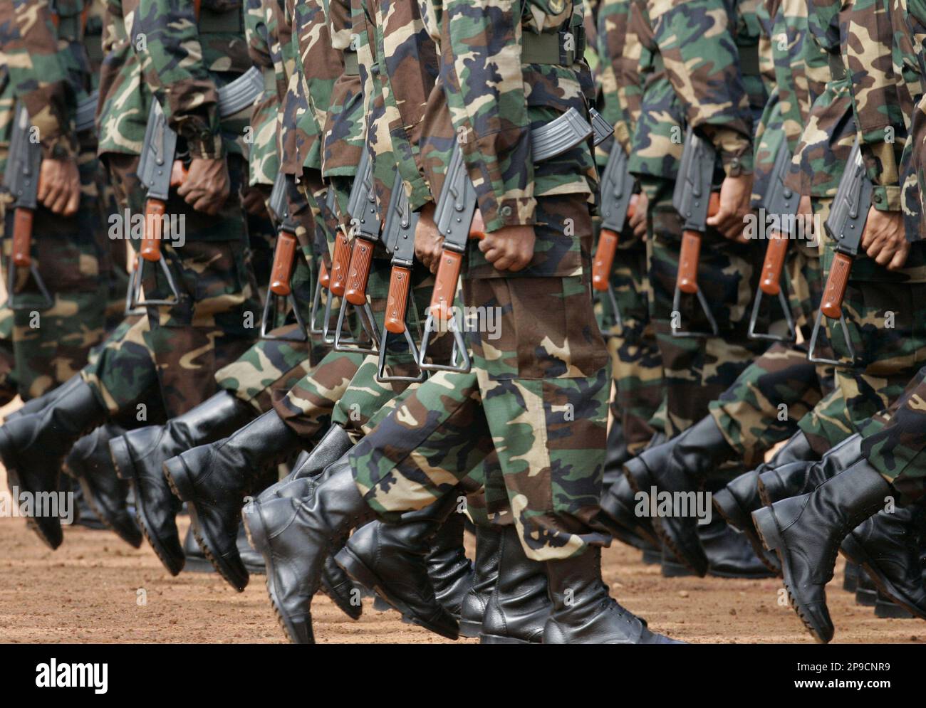 Sri Lankan army soldiers trained as U.N. peacekeepers march during a ...