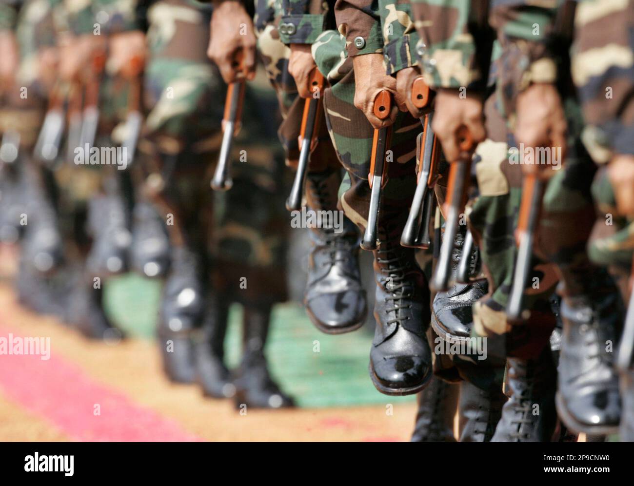 Sri Lankan army soldiers trained as U.N. peacekeepers march during a ...