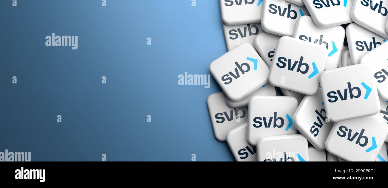 Logos of Silicon Valley Bank svb on a heap on a table. Copy space. Web banner format Stock Photo ...