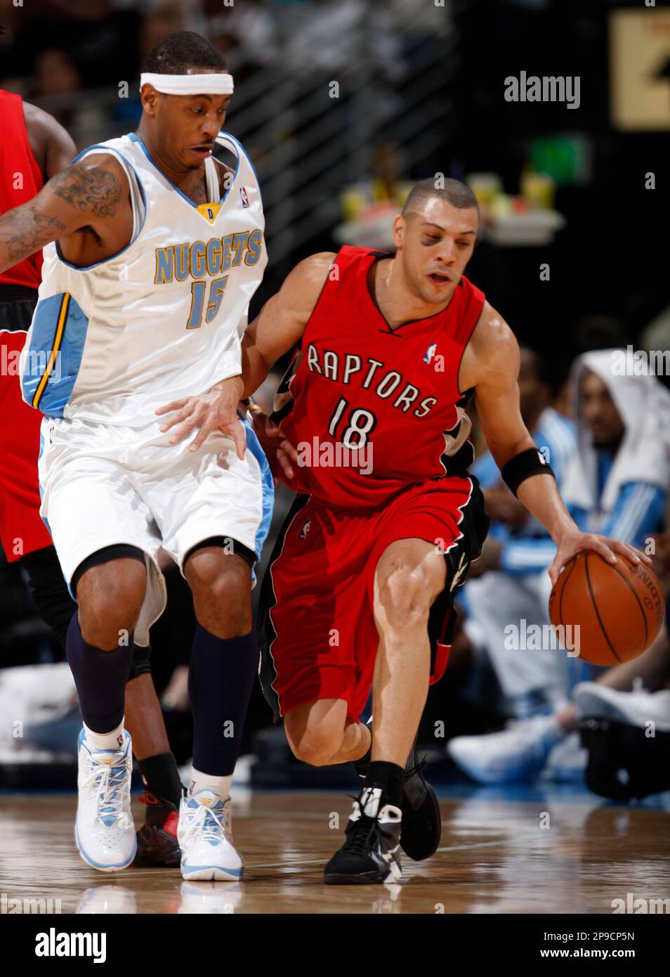 Toronto Raptors guard Anthony Parker, right, struggles to move the ball ...