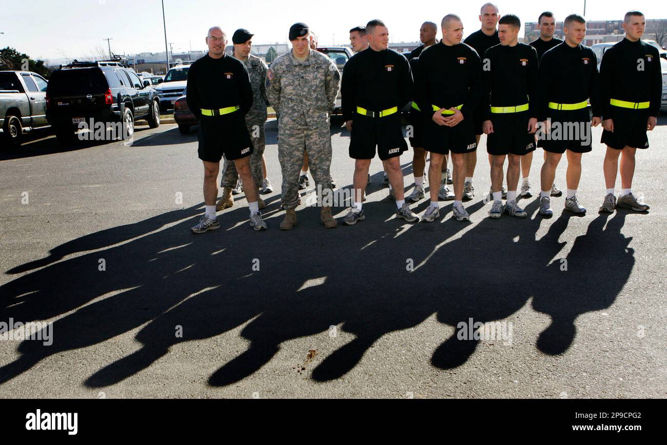 Sgt. Ryan Nyhus, second from left, stands with his unit before he re ...