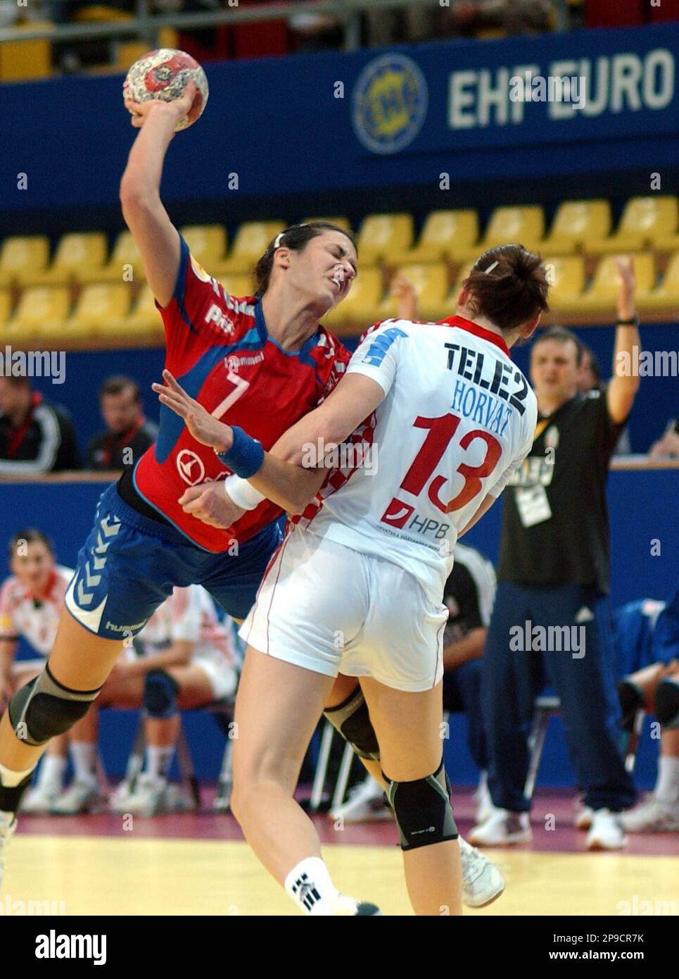 Serbia's Andrea Lekic, left, hurls the ball beside Croatia's Lidija ...