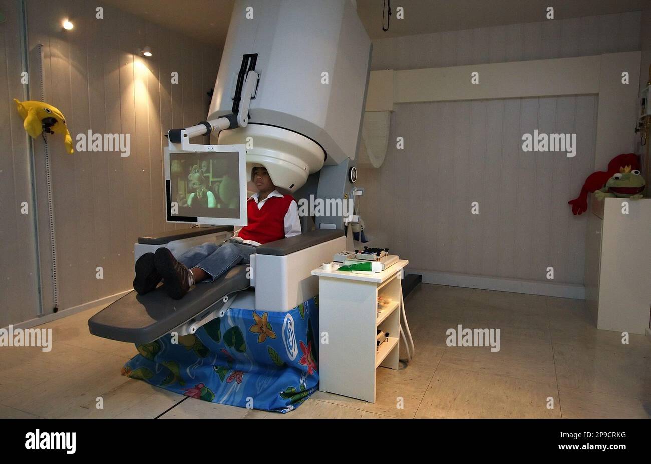 Parker Leiby, an autistic child, demonstrates the use of the ...