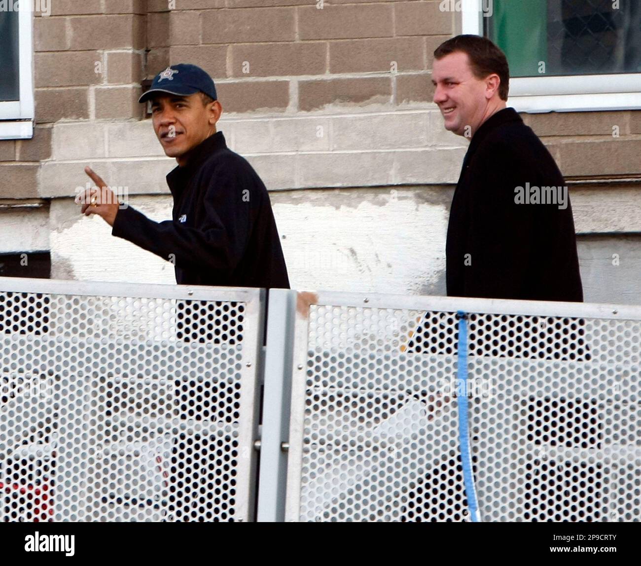 President-elect Barack Obama, left, arrives to a local gym for a ...