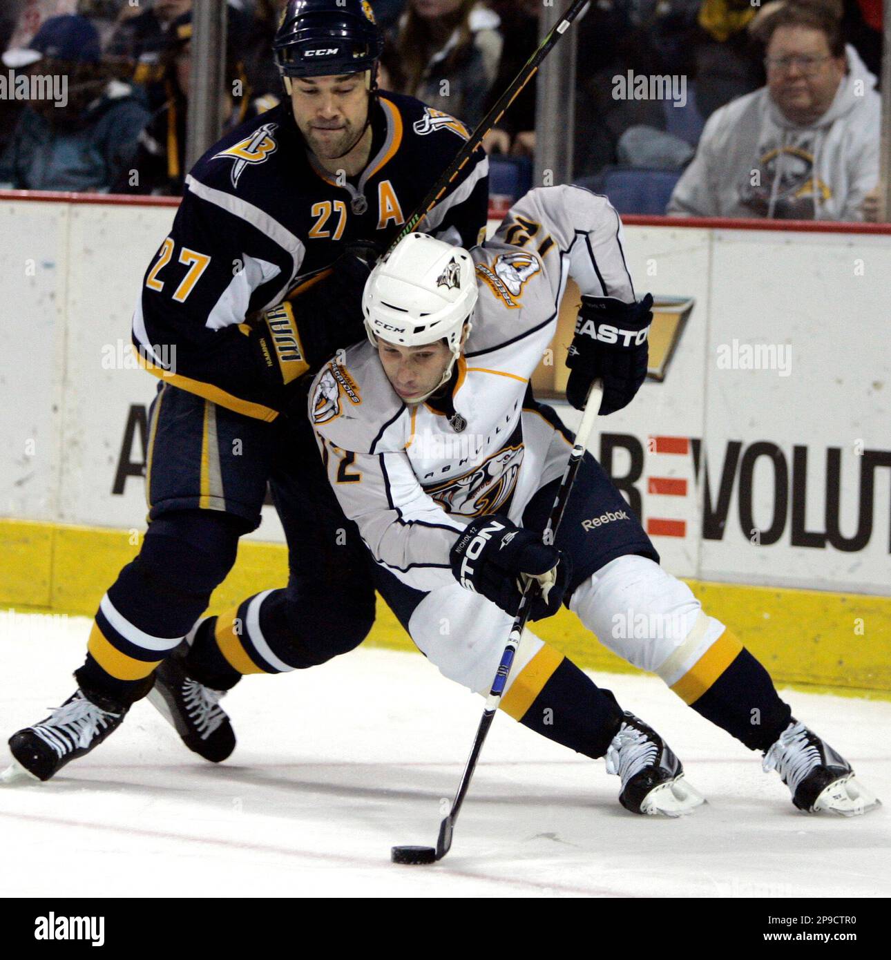 Nashville Predators' Scott Nichol (12) skates under pressure from ...