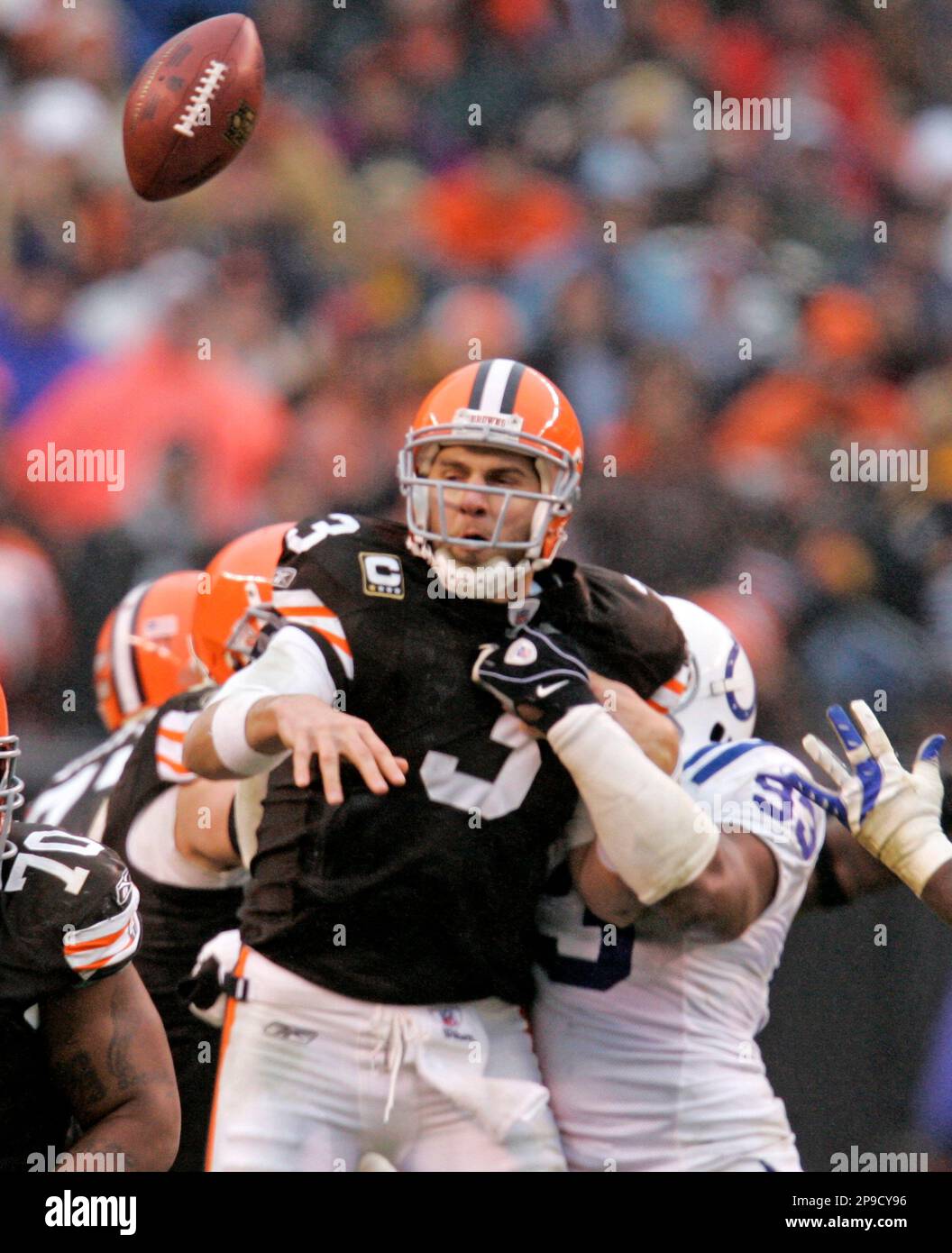Cleveland Browns quarterback Derek Anderson (3) fumbles the ball in the ...