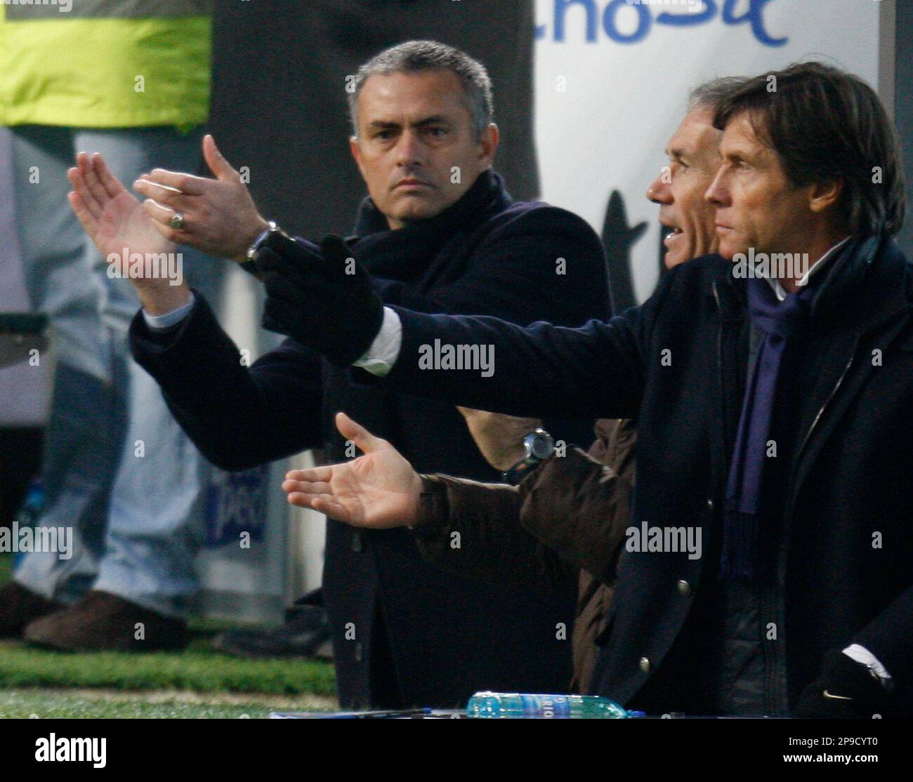 Inter Milan coach Jose' Mourinho, of Portugal, left, reacts during a ...