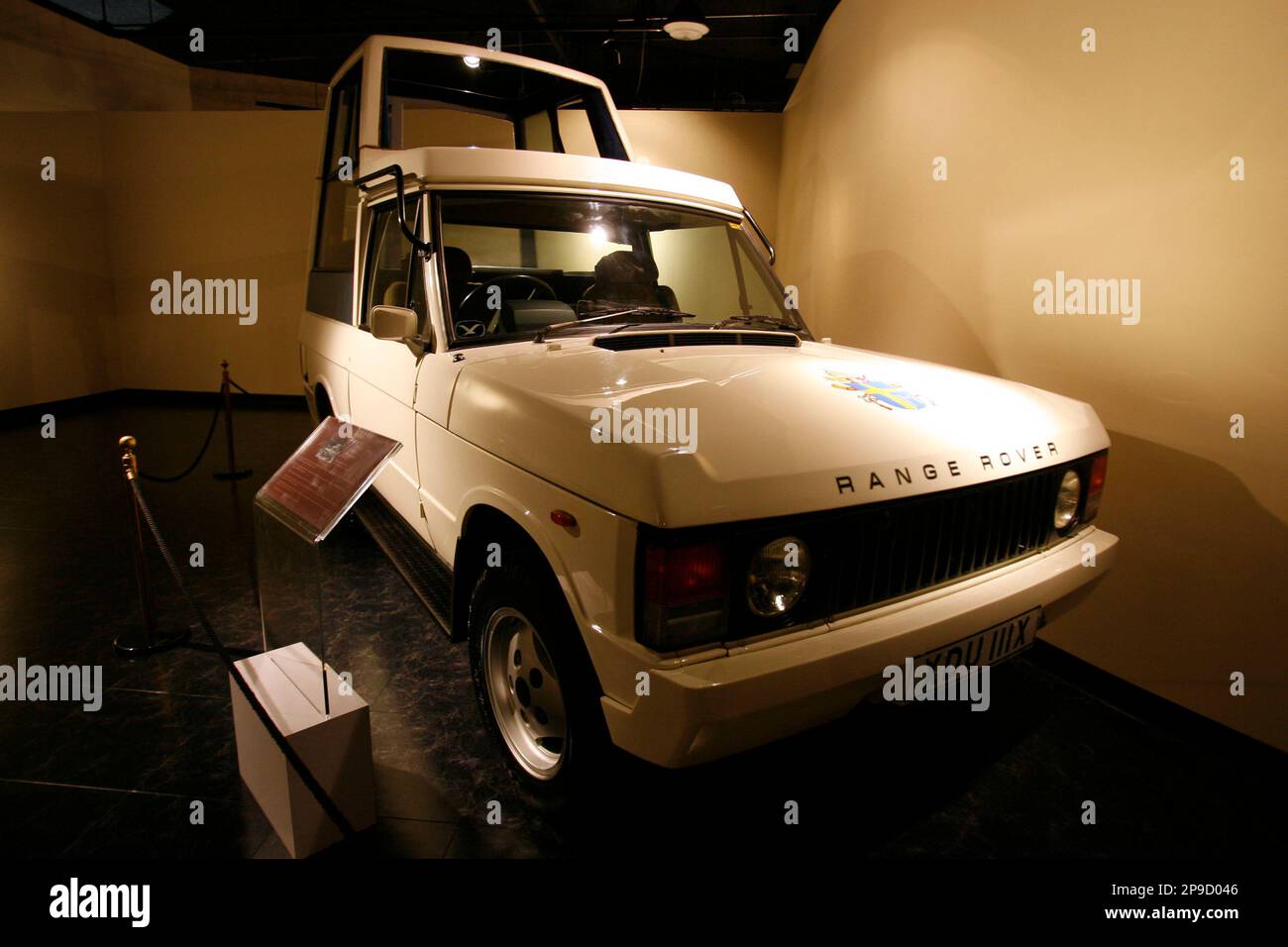A Popemobile is shown in an exhibit at the National Museum of Funeral ...