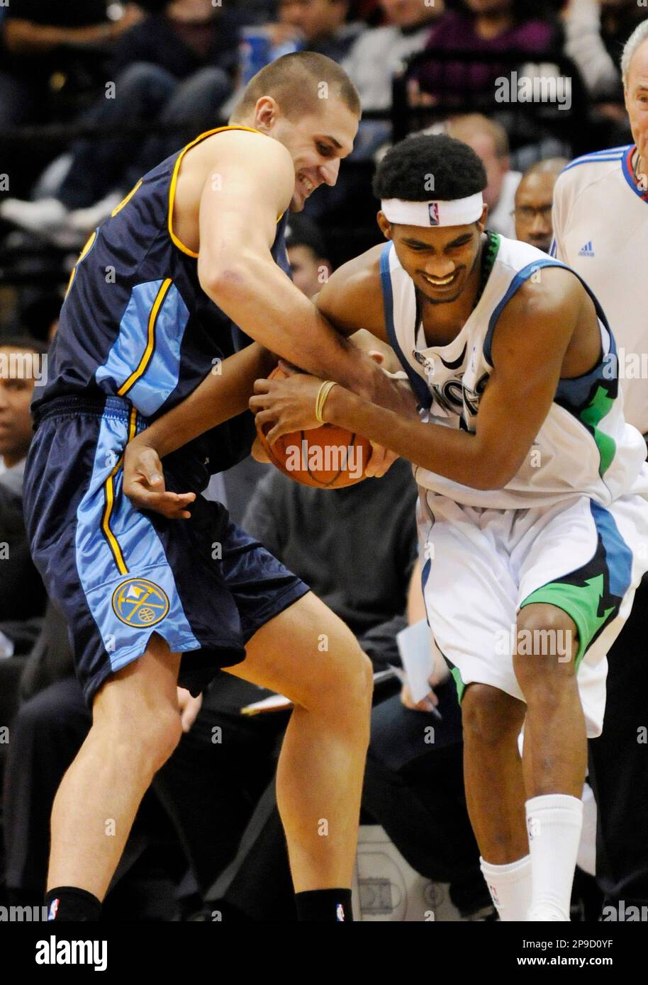 Denver Nuggets' Linas Kleiza, left, of Lithuania, battles Minnesota ...