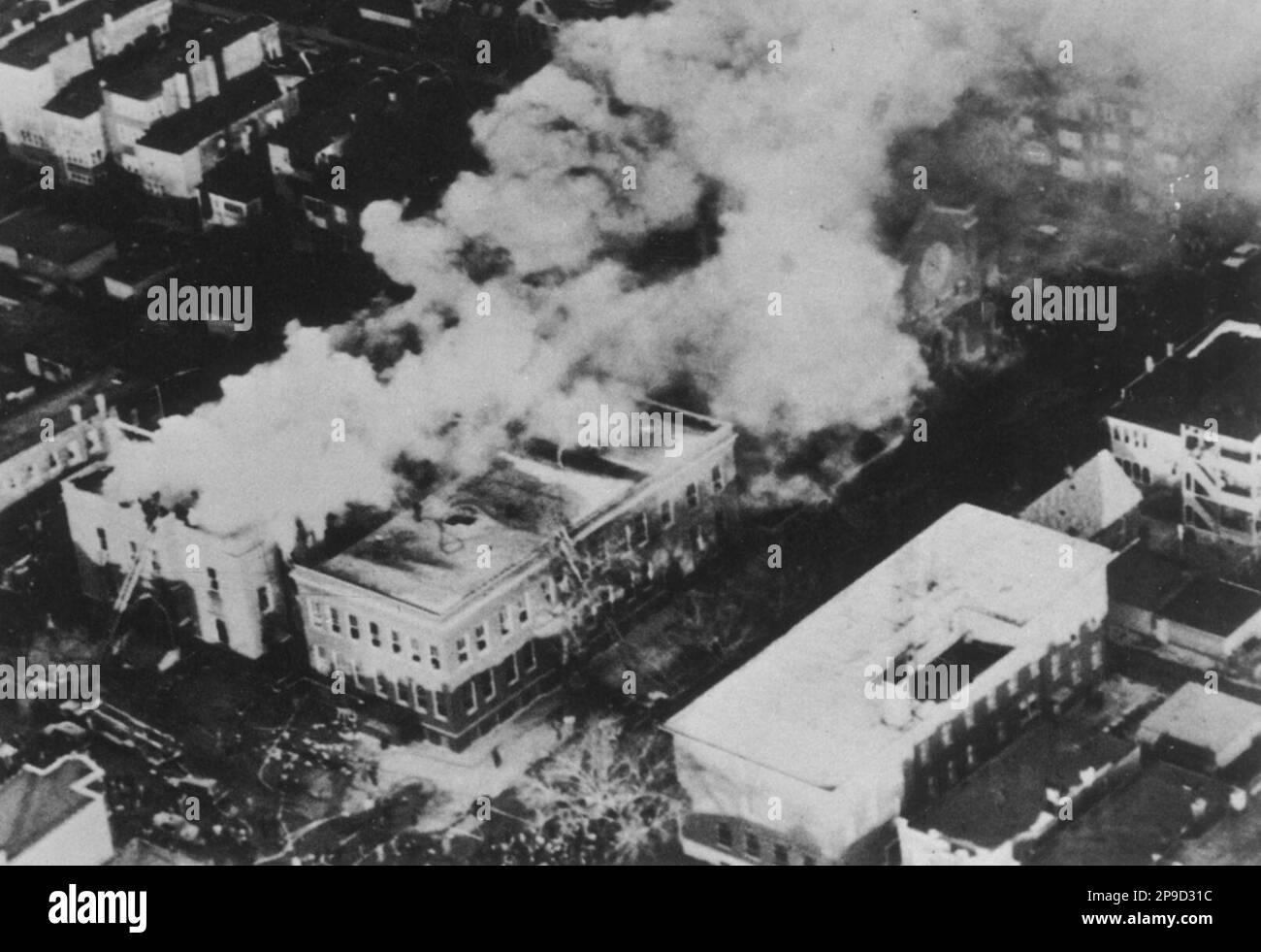 ** FILE **In this Dec. 1, 1958, Smoke pours from the Our Lady of the ...