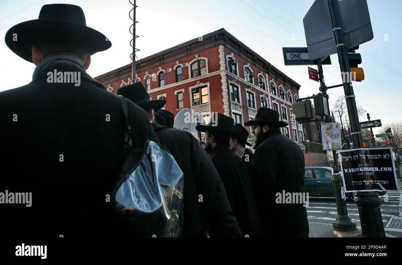 Members of an ultra-Orthodox Jewish group based in Brooklyn gather ...