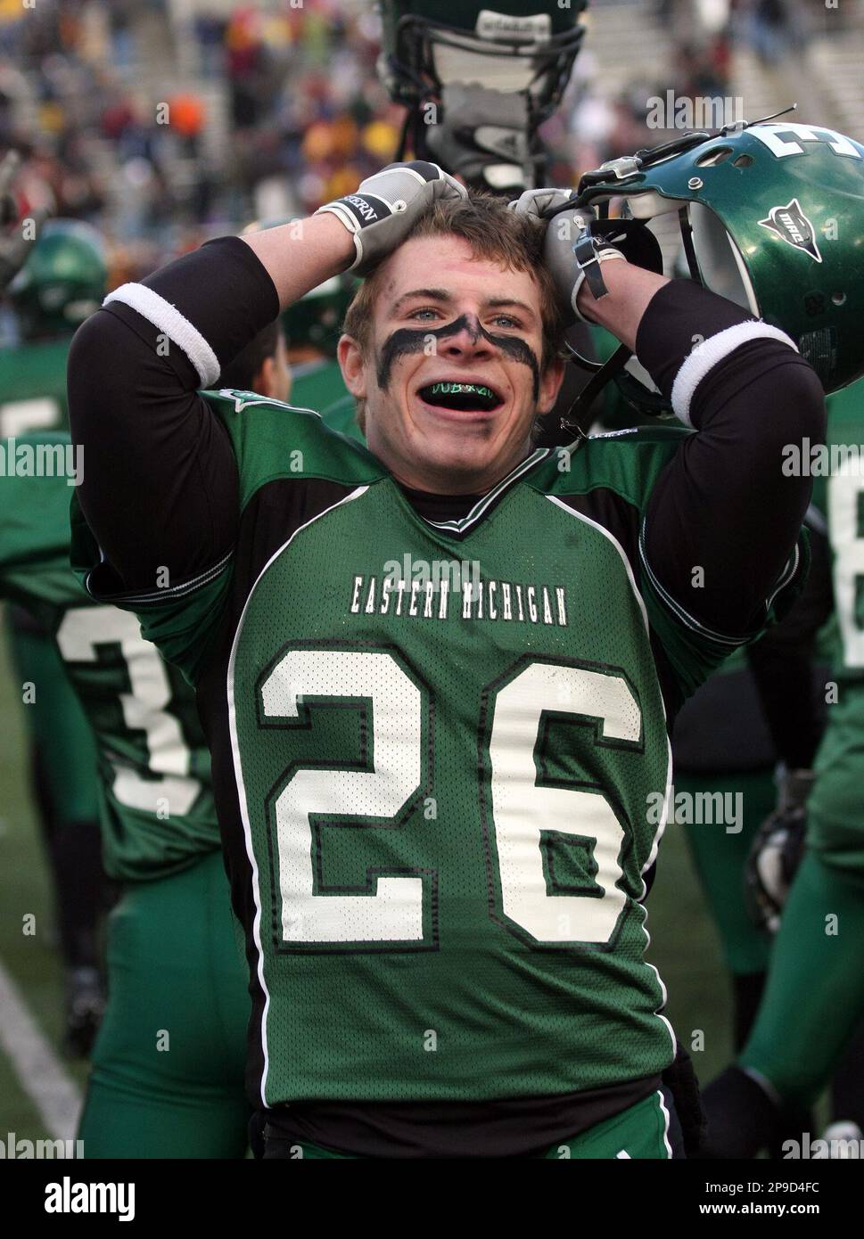 Eastern Michigan running back Corey Welch reacts after an NCAA college ...