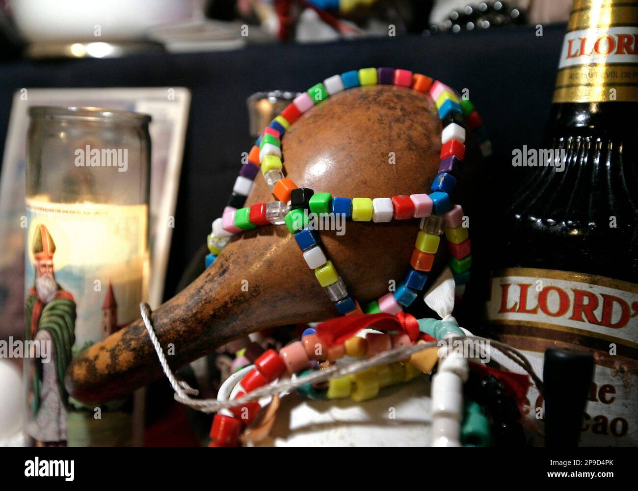 Voodoo offerings sit at a Gede ceremony at the home of Voodoo priest ...
