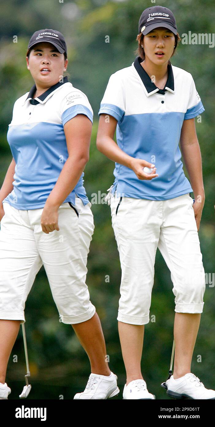 Team Asia's Inbee Park, left, and Song Hee Kim of South Korea play ...