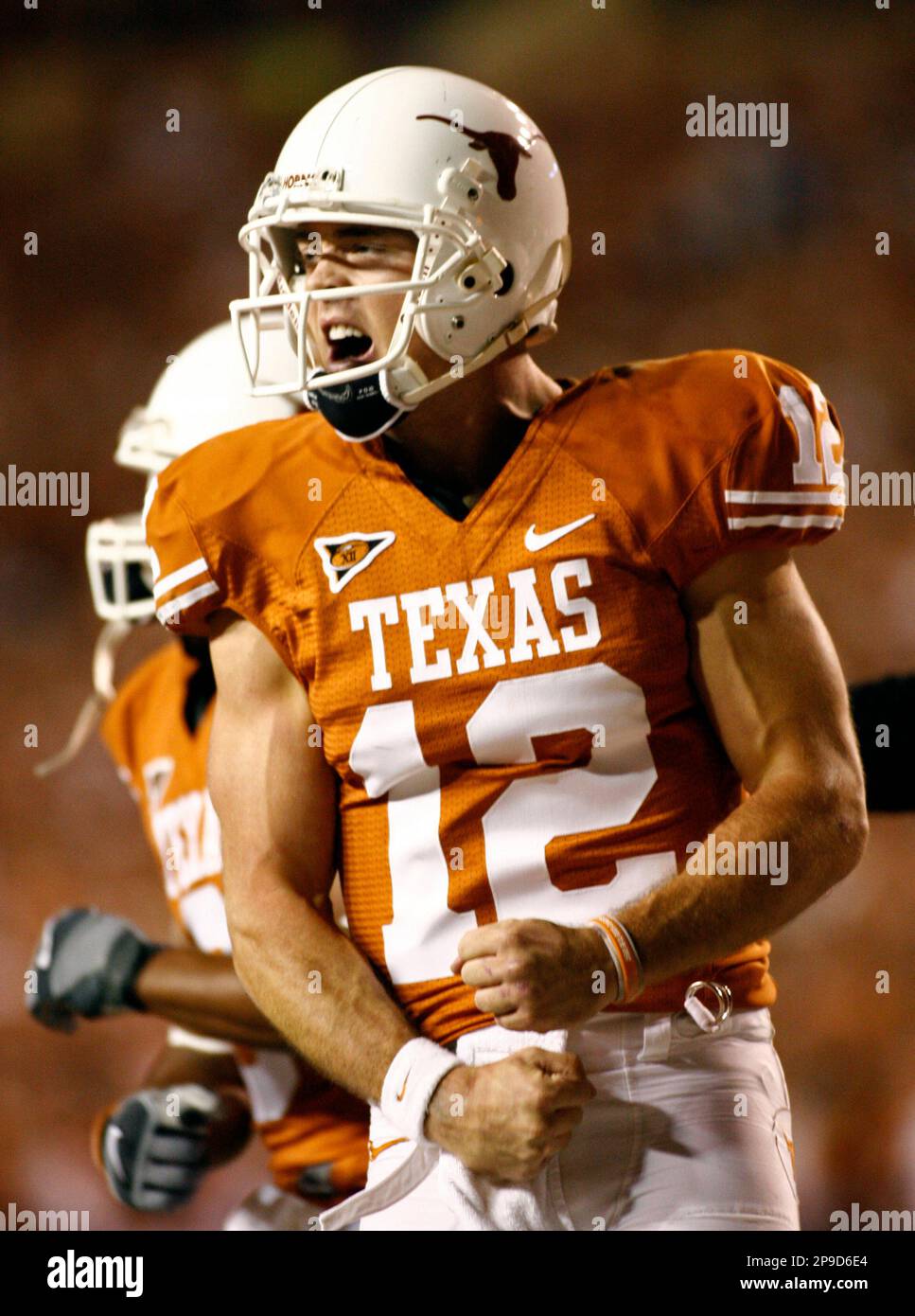 Texas quarterback Colt McCoy celebrates his touchdown run during first ...