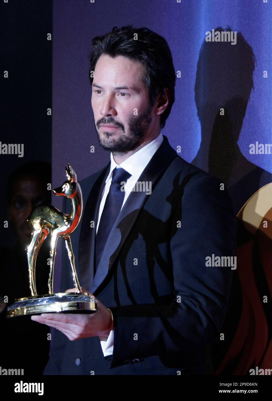 U.S. actor Keanu Reeves shows the prize after the Bambi 2008 media ...
