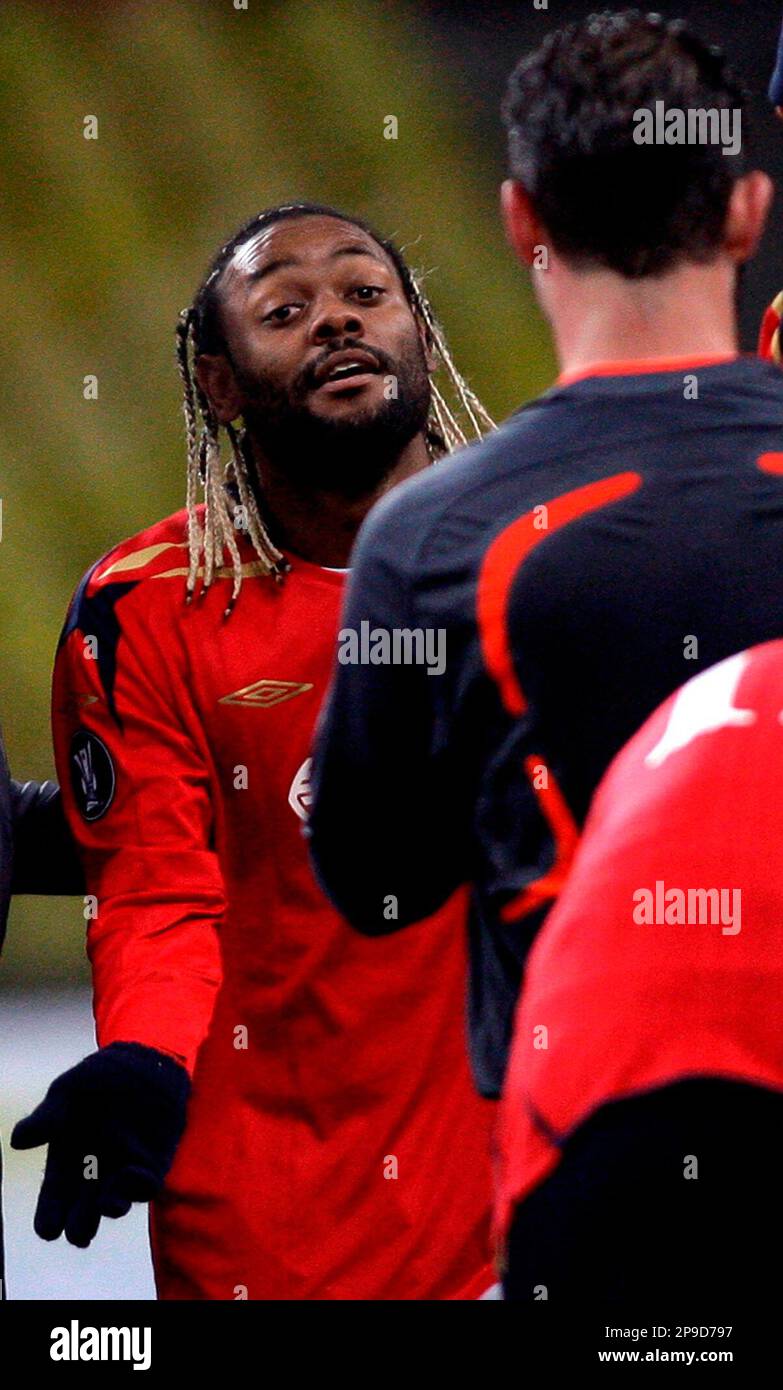 CSKA Moscow's Vagner Love, left, gestures to Portuguese referee Duarte ...