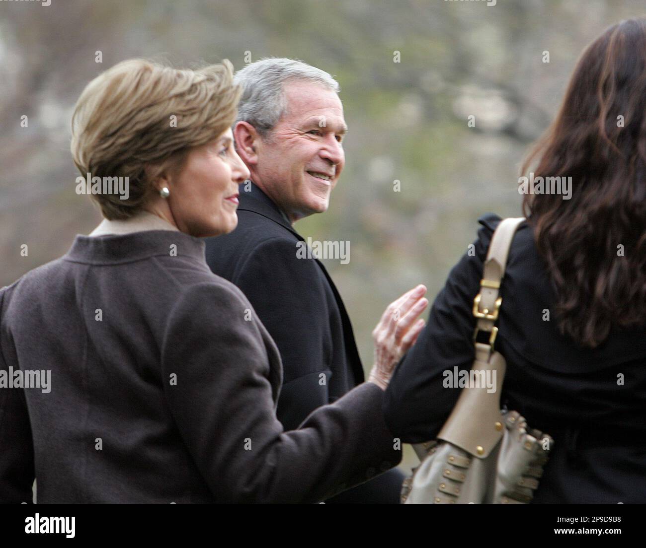 President George W. Bush, his wife Laura and their daughter Barbara ...