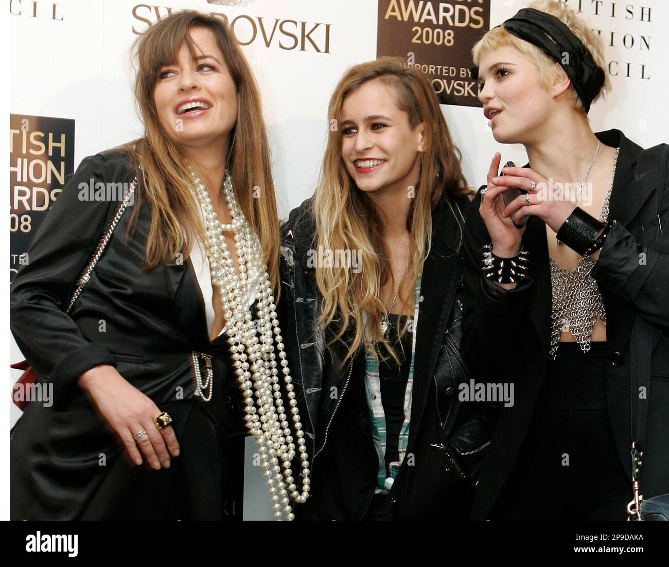 Jade Jagger, left, Alice Dellal and Pixie Geldof pose for the cameras ...