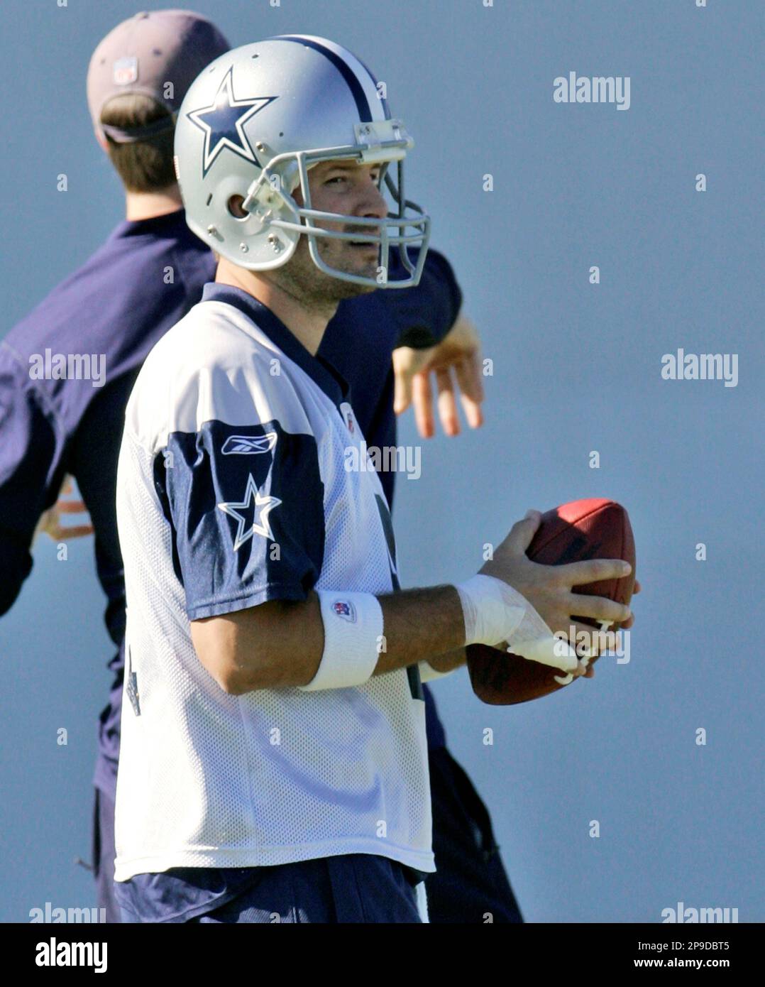 Dallas Cowboys quarterback Tony Romo prepares to make a throw before ...