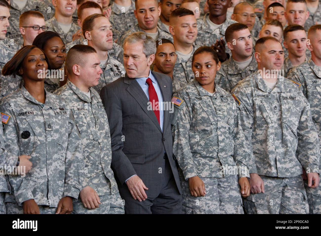 President George W. Bush poses with soldiers after speaking at Fort ...