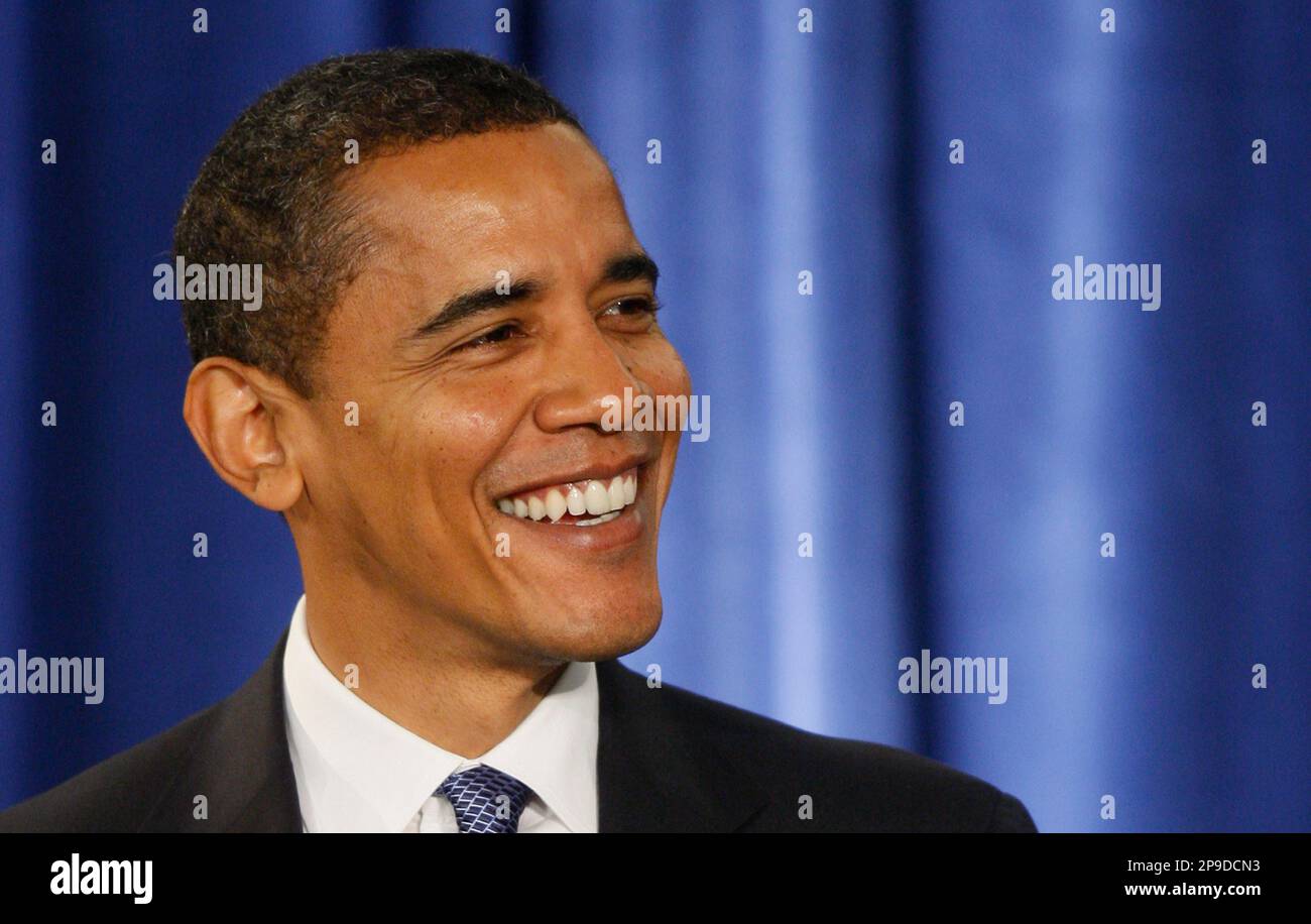 President-elect Barack Obama smiles during a news conference in Chicago ...