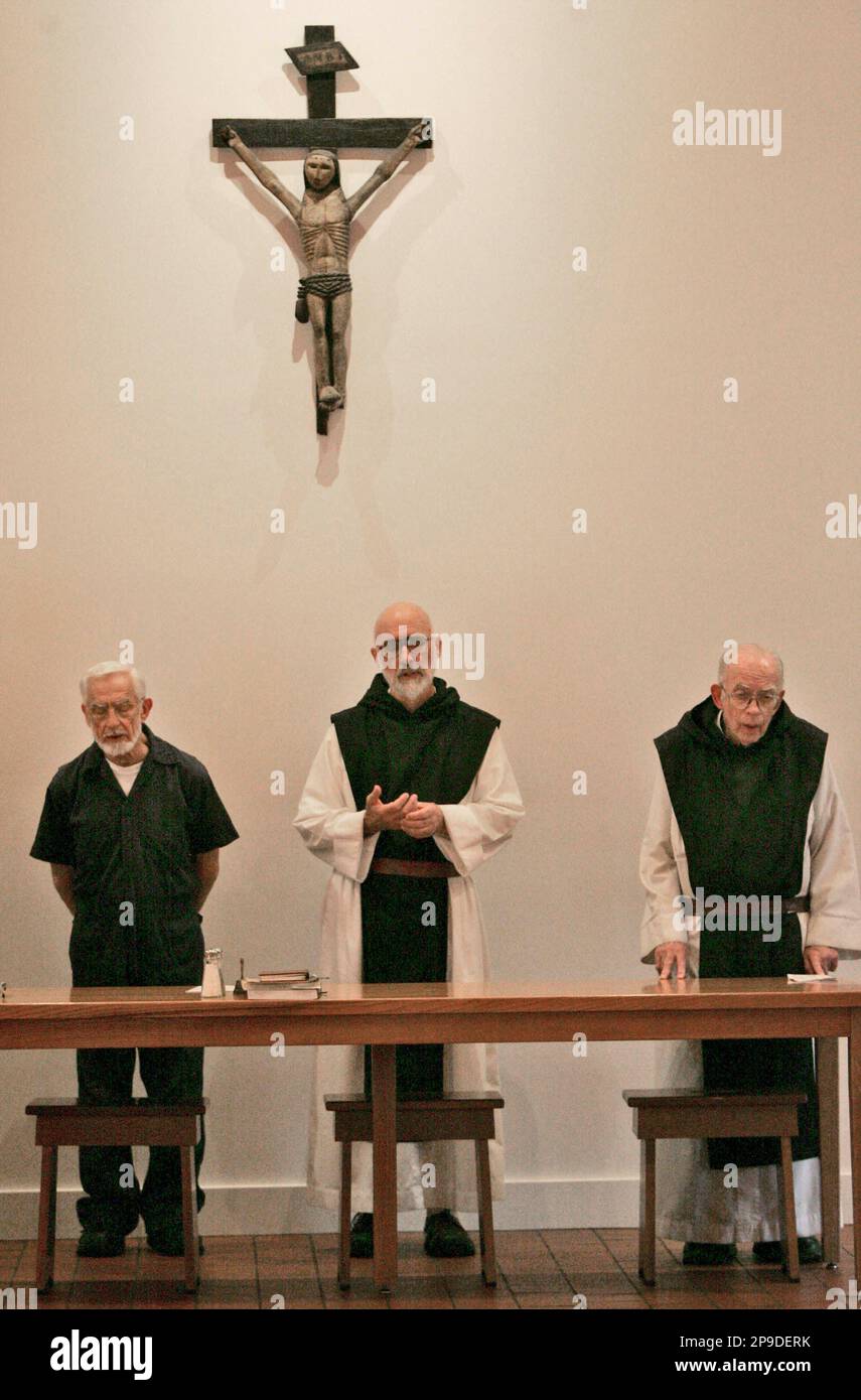 The abbot, Father Stan Gumula, center, leads the monks and brother ...