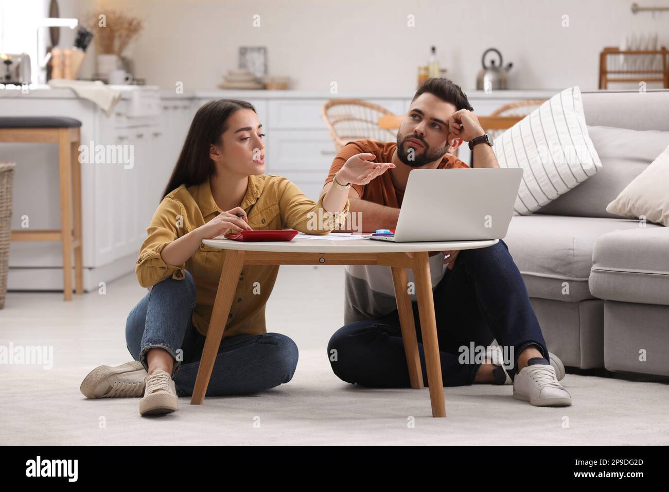 Conversation laptop couple budget hi-res stock photography and images ...