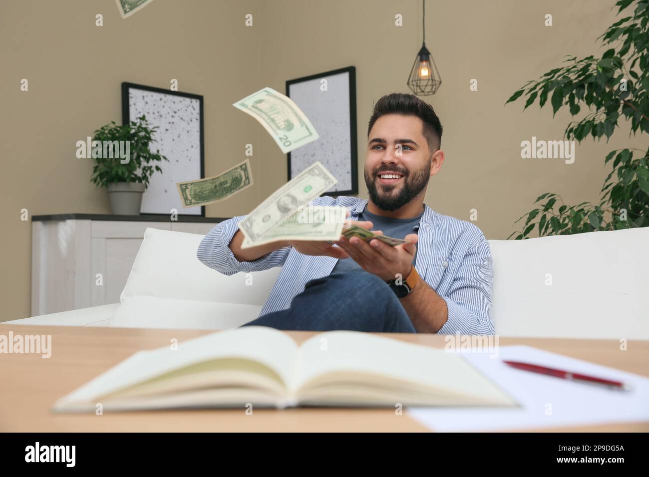 Throwing money and man hi-res stock photography and images - Alamy