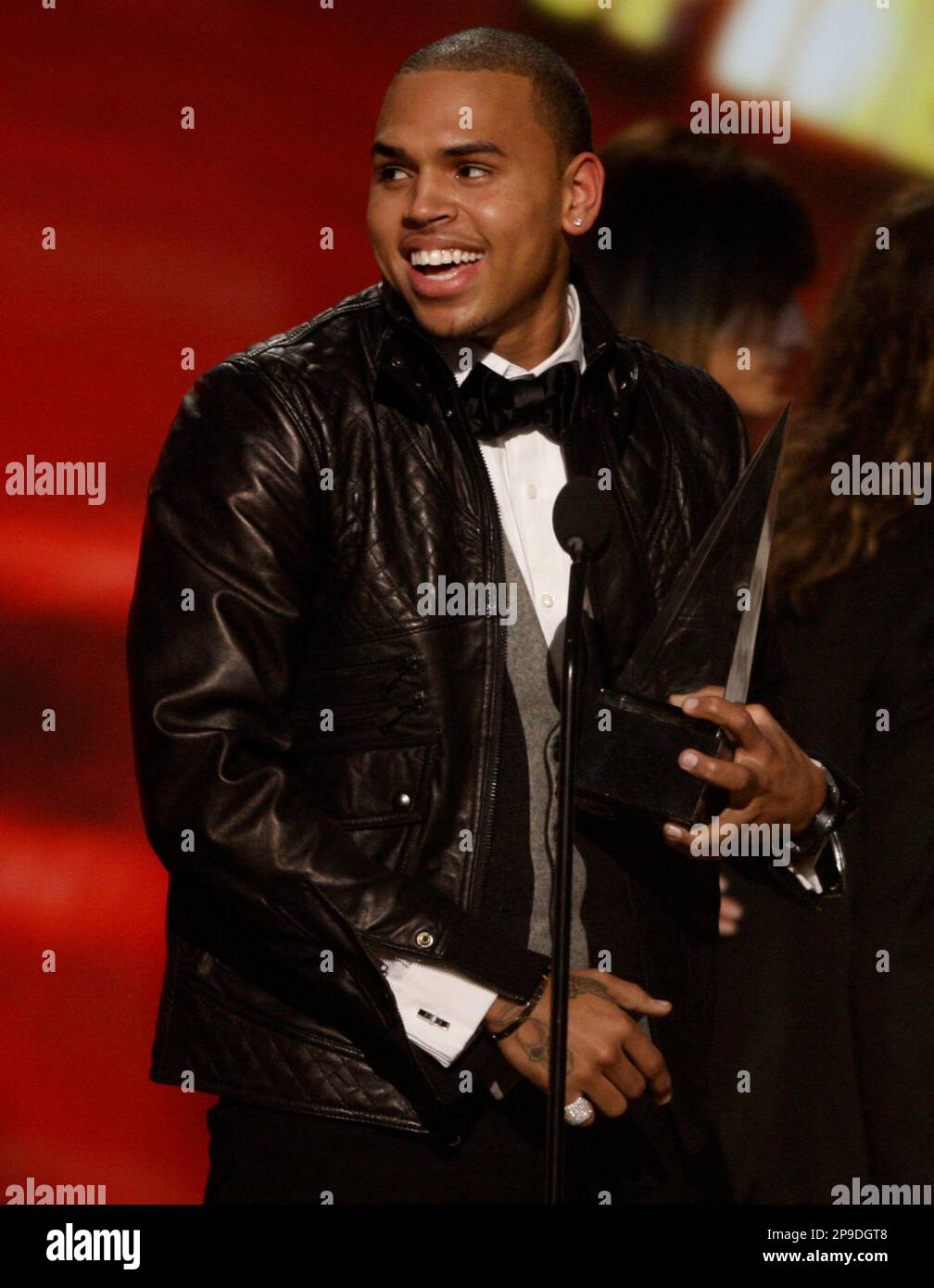 Chris Brown accepts the artist of the year award at the American Music ...
