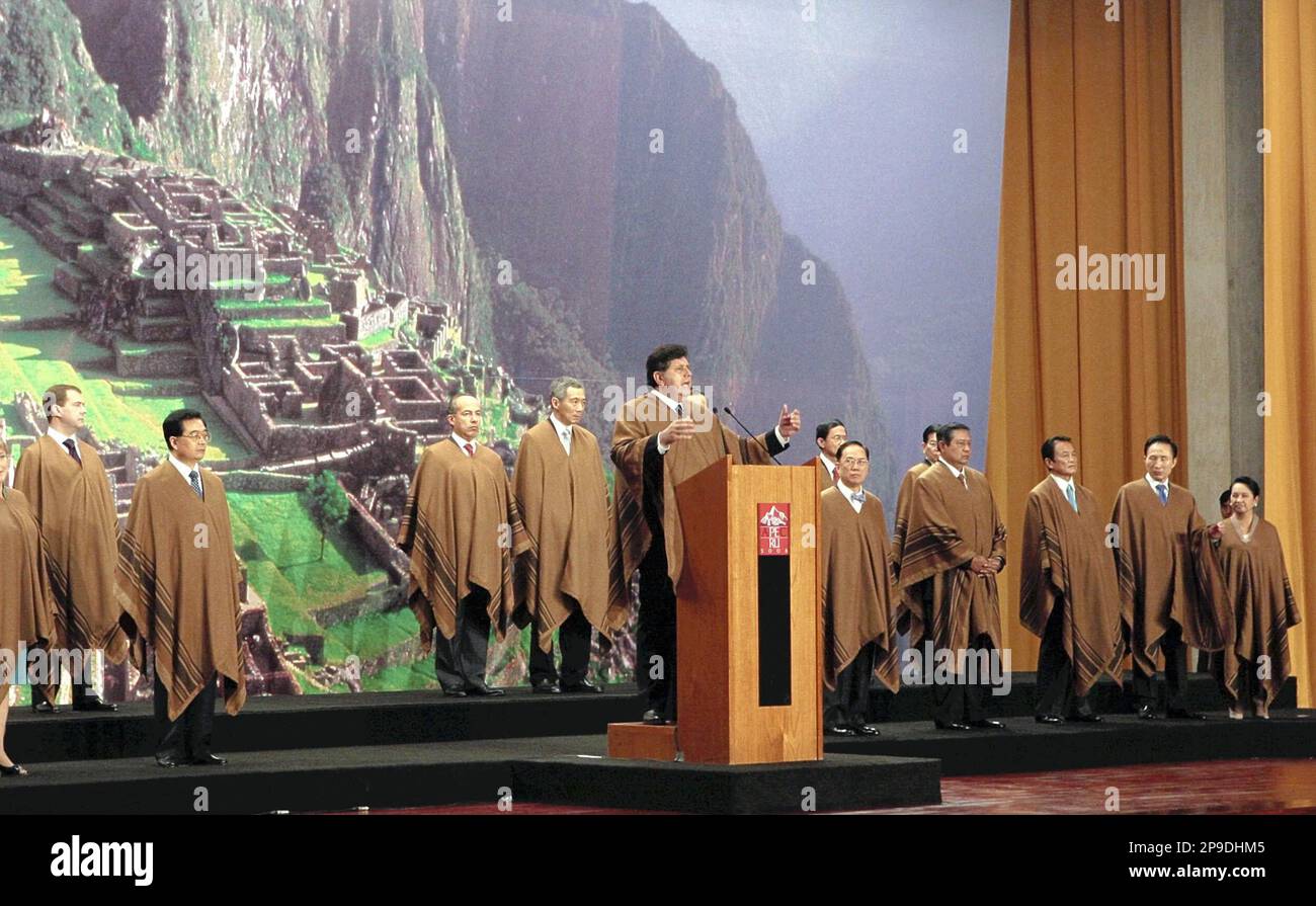 Peru's President Alan Garcia, center, delivers the final statement of ...