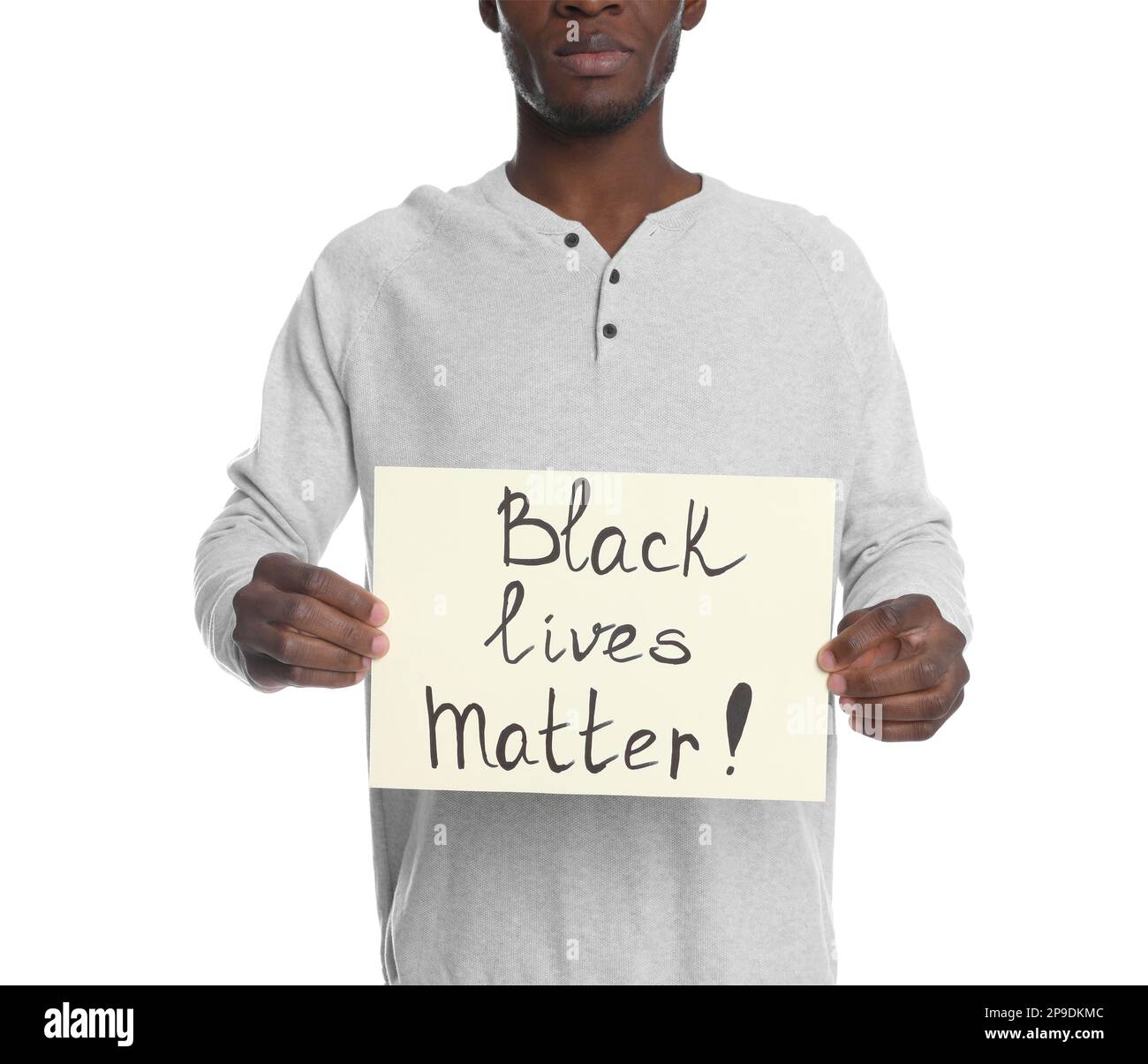 African American man holding sign with phrase Black Lives Matter on ...