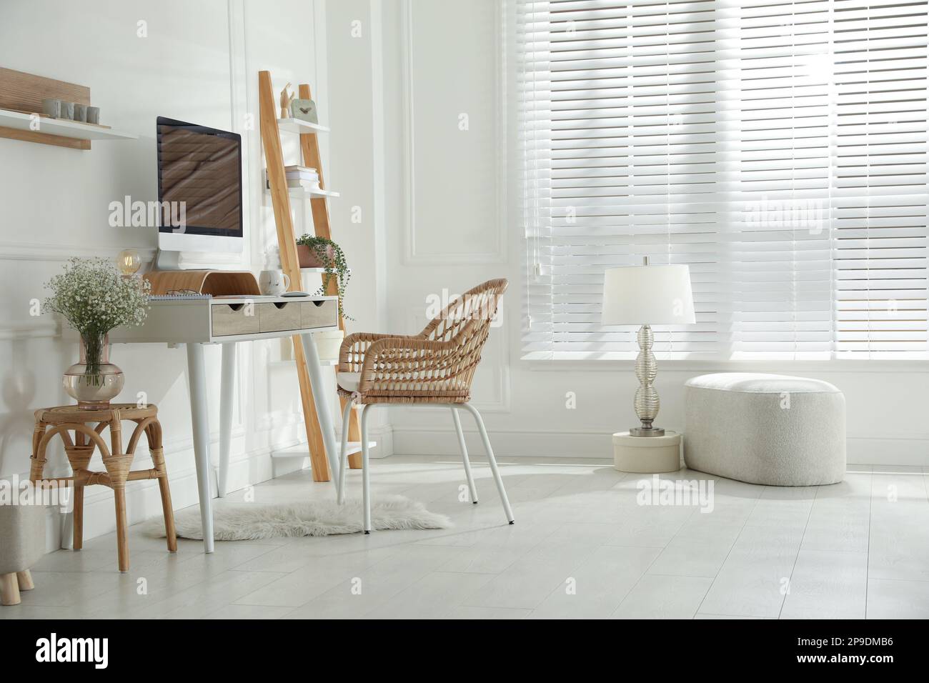 Comfortable workplace with modern computer and lamp in room. Interior ...