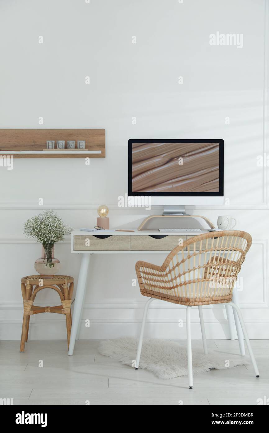 Comfortable workplace with modern computer and lamp in room. Interior ...