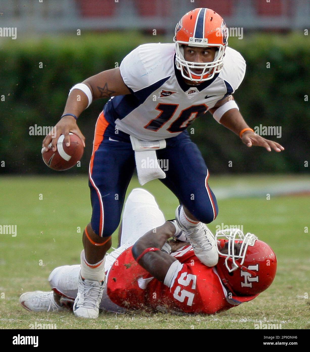 UTEP quarterback Trevor Vittatoe (10) breaks away from Houston's Marcus ...