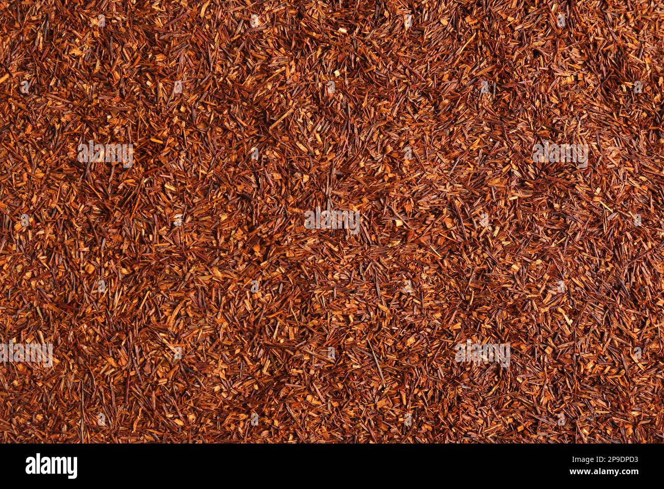 Heap of dry rooibos tea leaves as background, top view Stock Photo - Alamy