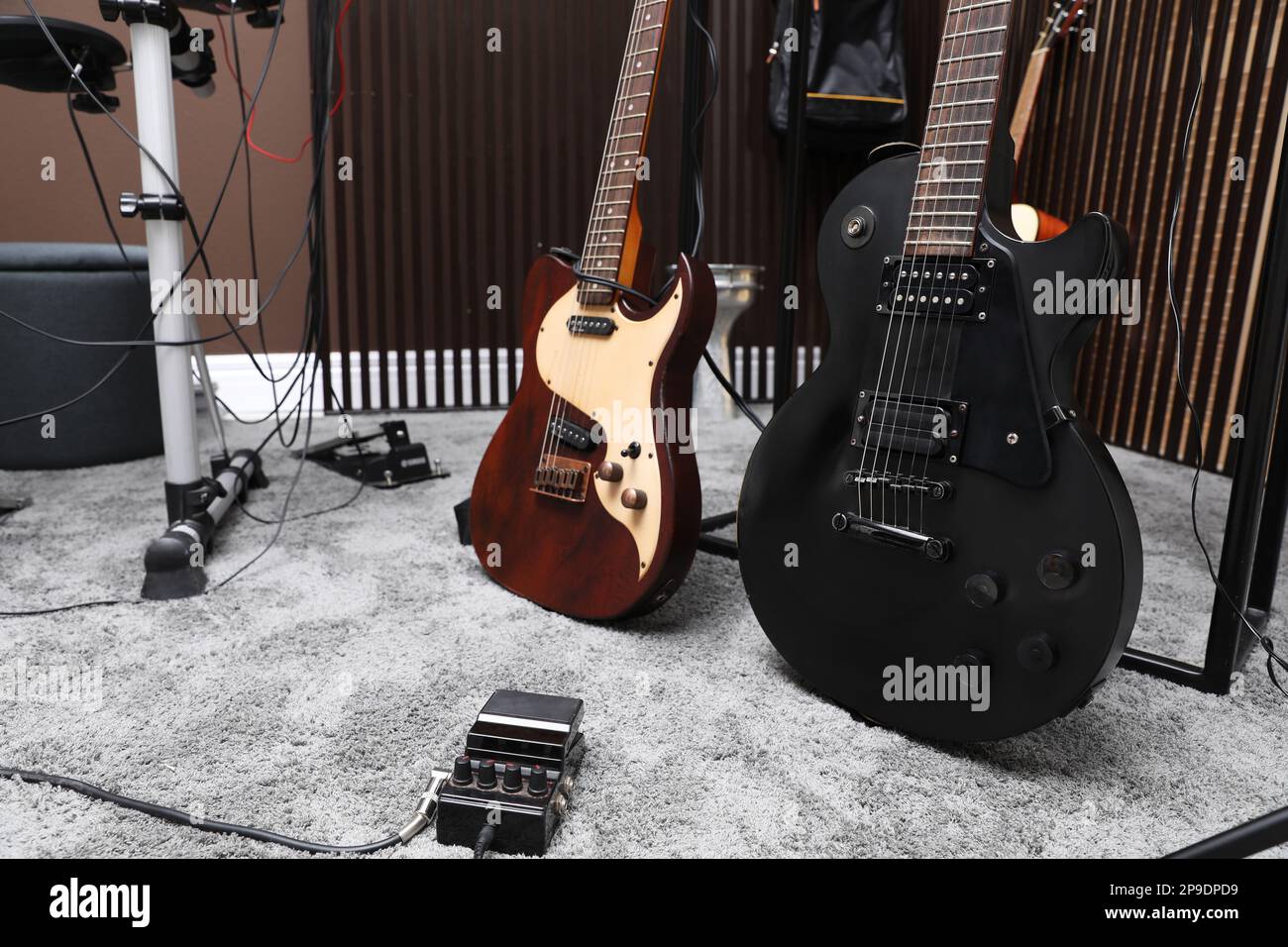 Electric guitars and pedal at recording studio. Music band practice ...