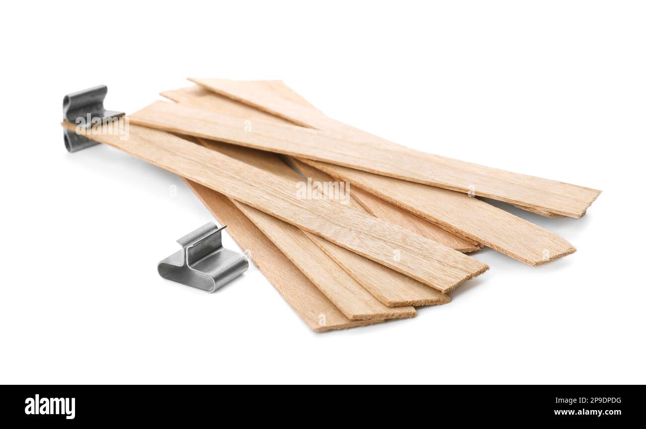 Wooden wicks with stabilizers on white background. Homemade candle ...