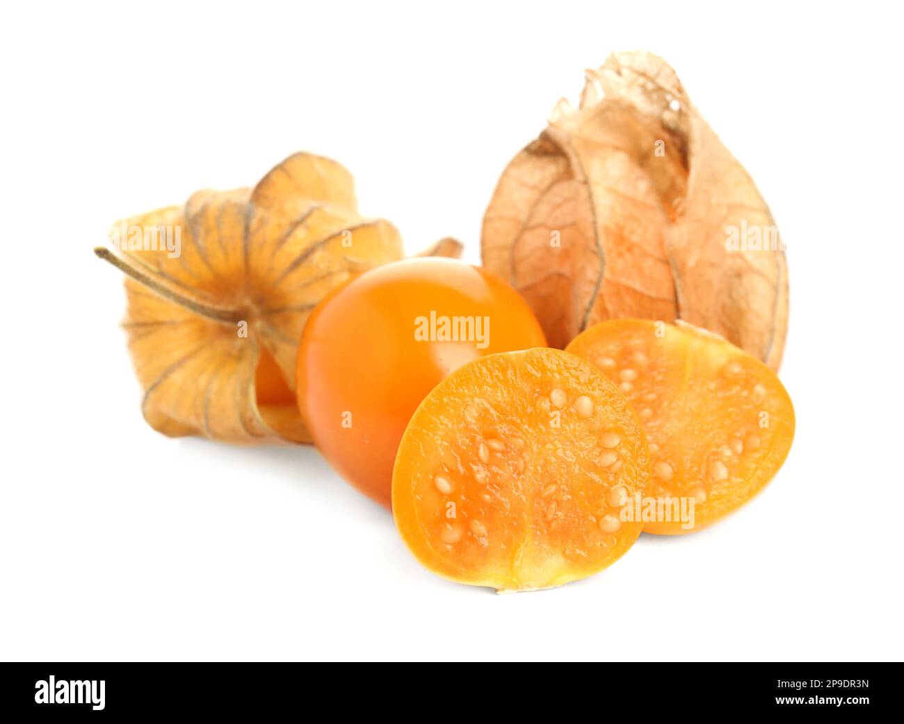 Cut and whole physalis fruits with dry husk on white background Stock ...
