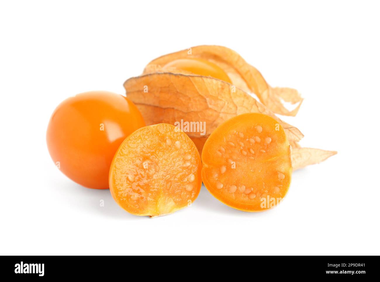 Cut and whole physalis fruits with dry husk on white background Stock ...