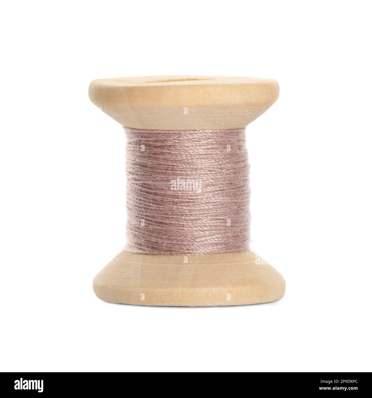 Wooden spool of pink sewing thread isolated on white Stock Photo - Alamy