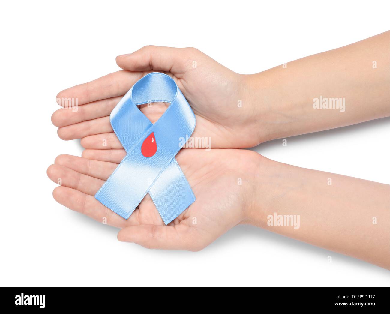 Woman holding light blue ribbon with paper blood drop on white ...