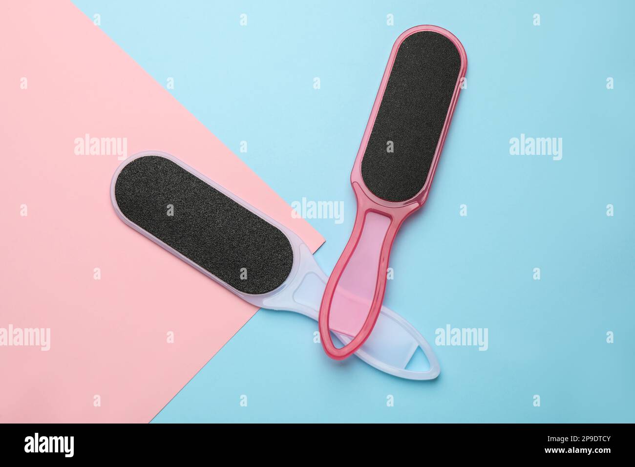 Foot files on color background, flat lay. Pedicure tools Stock Photo ...